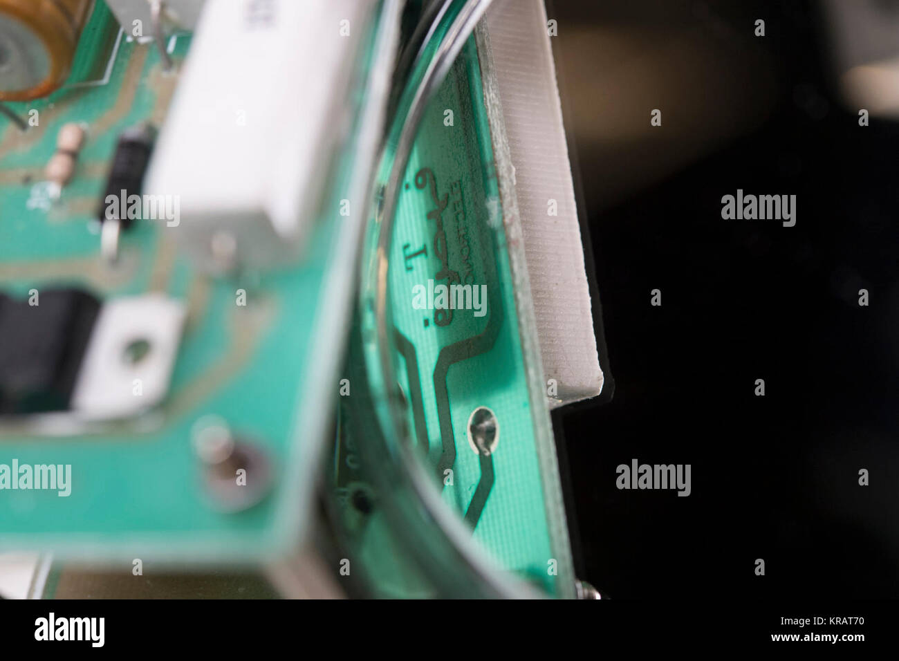 A mirror reflects an Iranian state-owned and operated company’s mark ...