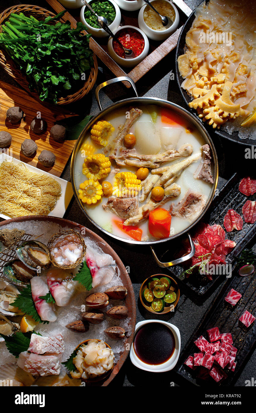 Seafood in hot pot Stock Photo - Alamy