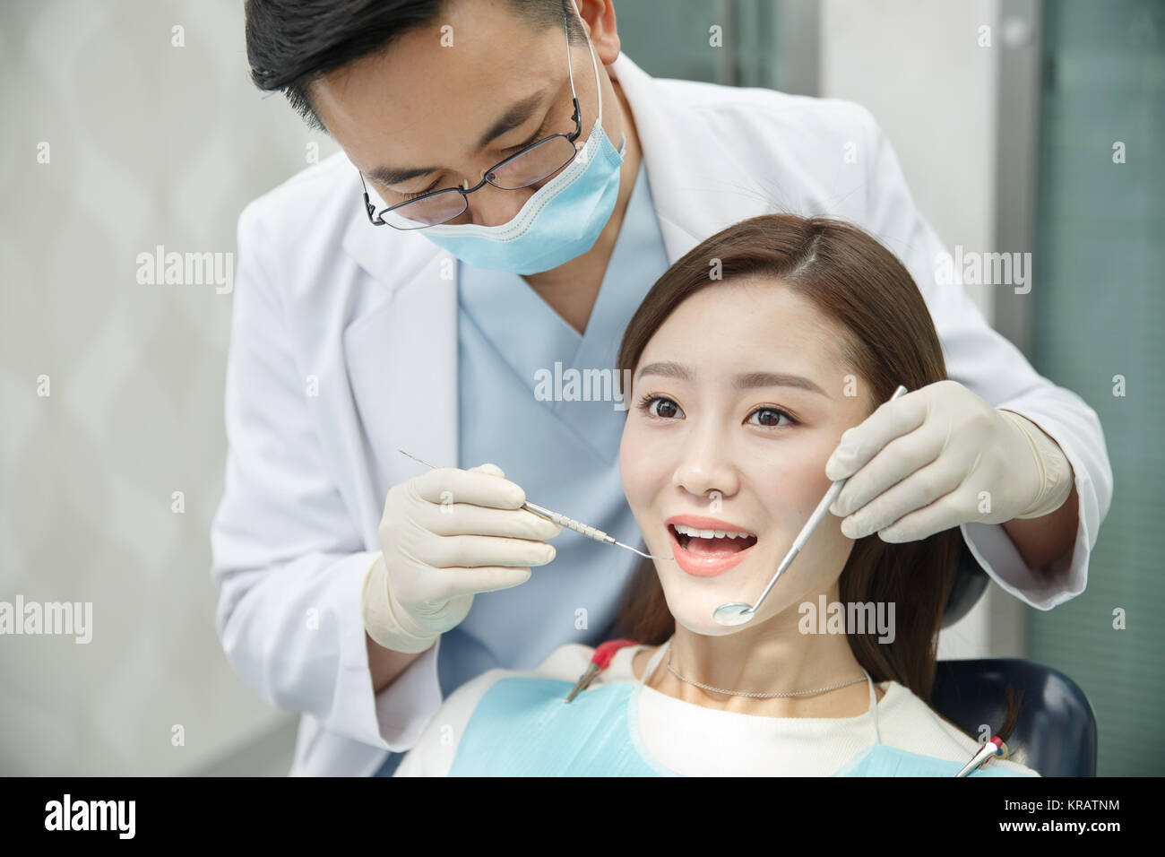 Male dentists and female patients Stock Photo - Alamy