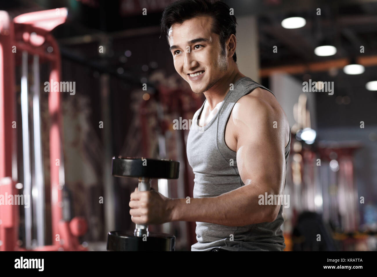 Young men exercise in the gym Stock Photo - Alamy
