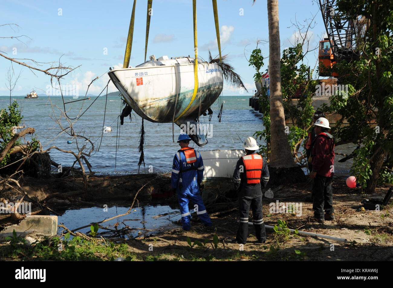 Local salvage crews, working in support of the Hurricane Maria ESF-10 ...
