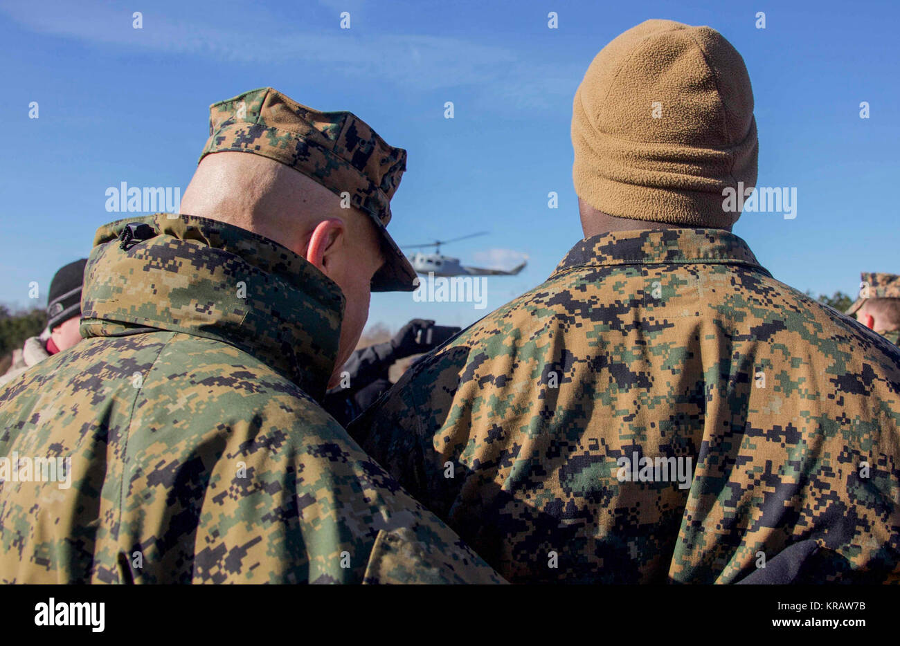 Commandant of the Marine Corps Gen. Robert B. Neller, left, watches as ...