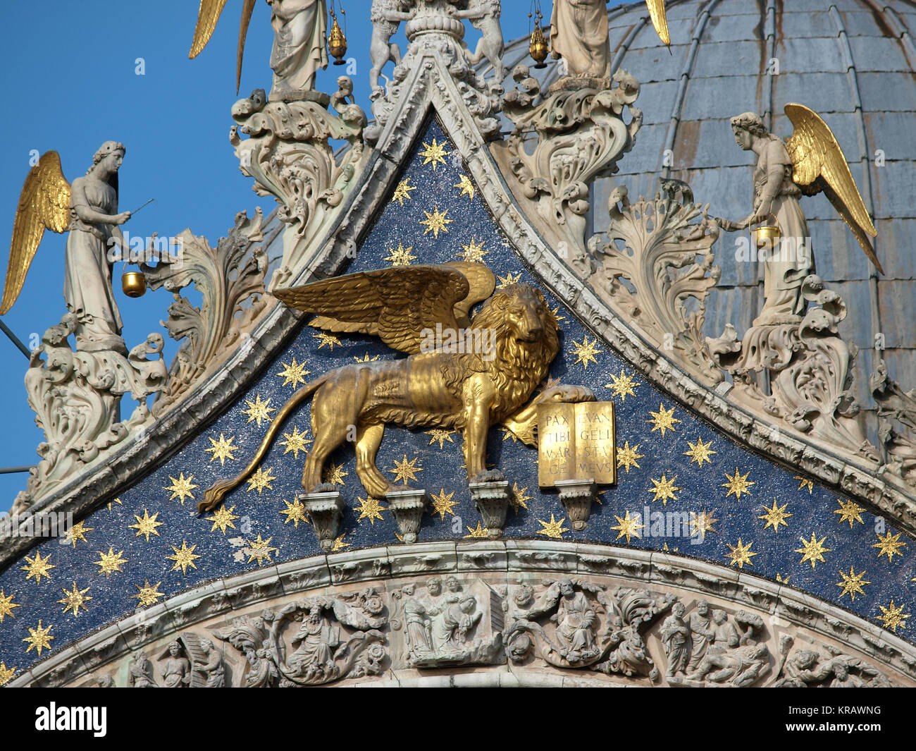 Venice - Lion of St. Mark's surrounded by angels on the facade of the ...