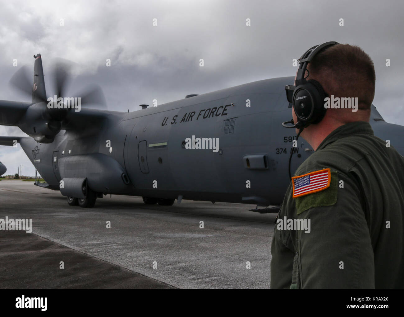 Master Sgt. Josh McMahan, 36th Airlift Squadron loadmaster, performs a ...