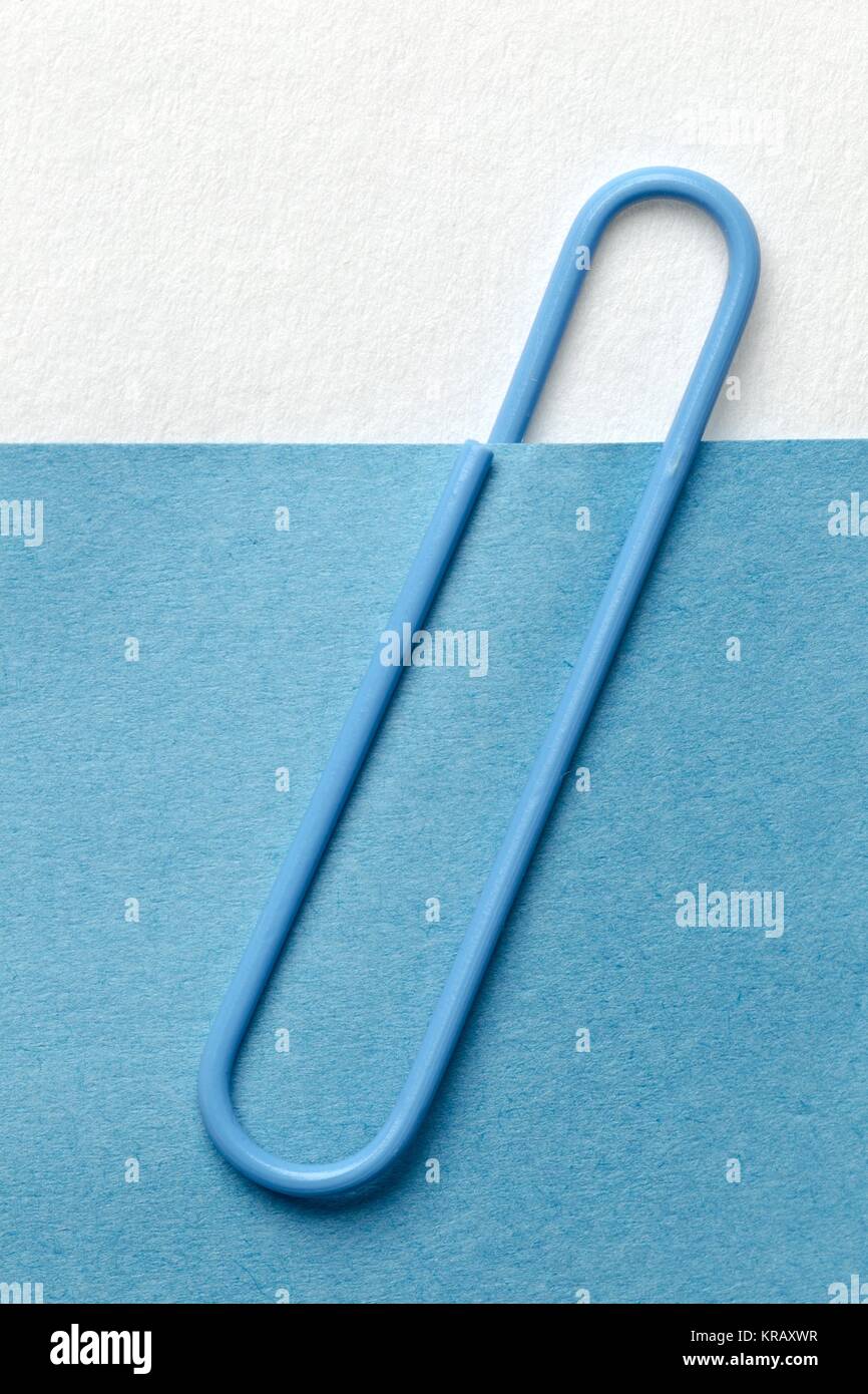 blue paper clip on note Stock Photo - Alamy