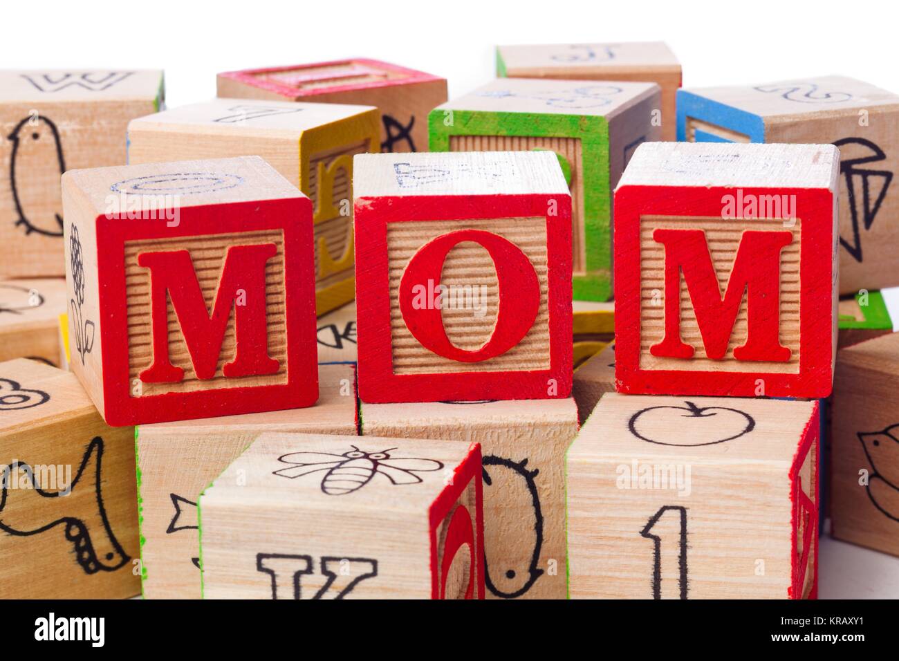 building blocks forming a word mom Stock Photo - Alamy