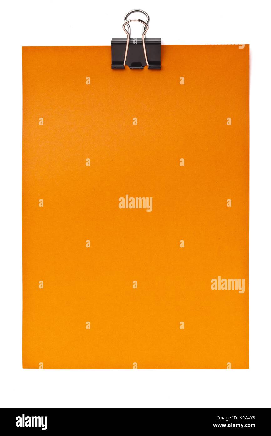 bulldog clip and orange paper sheet Stock Photo - Alamy
