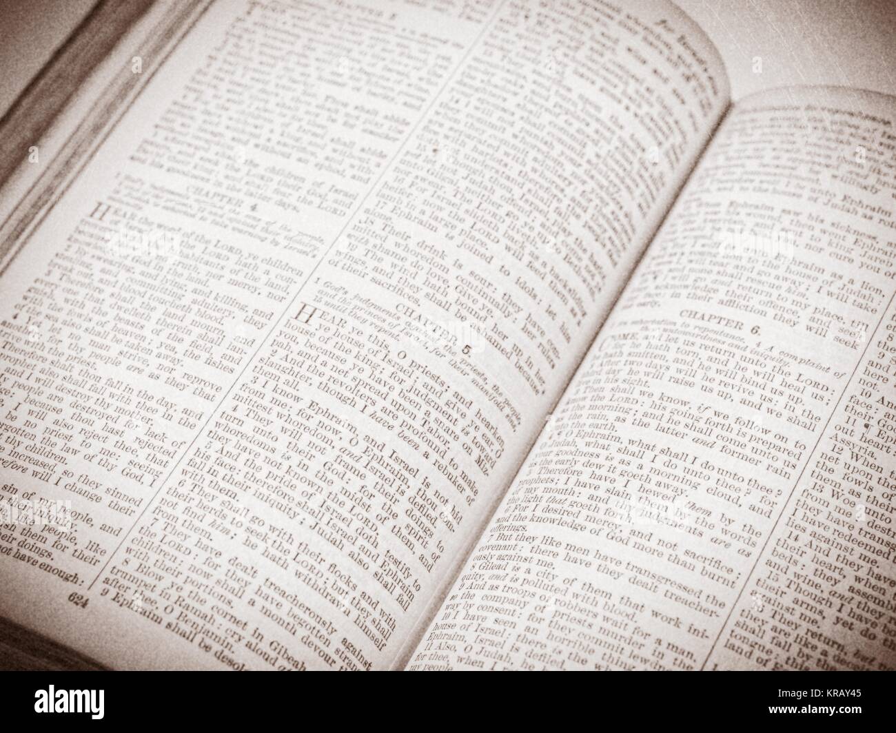 Close up of opened book pages against vintage background Stock Photo ...