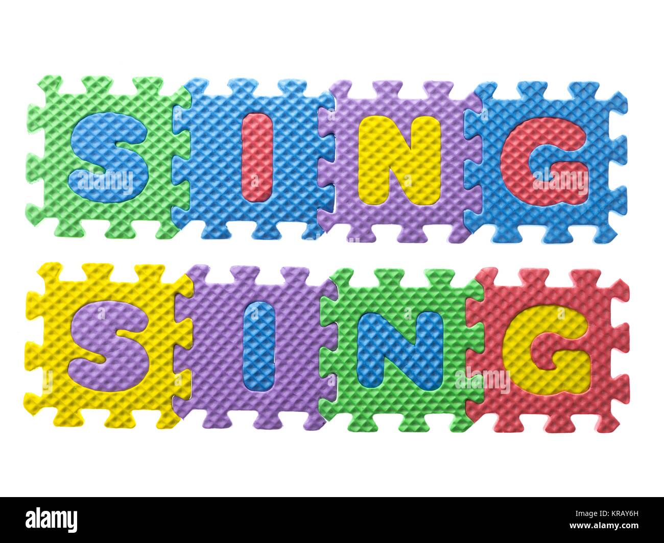 close up shot of puzzle forming sing Stock Photo - Alamy