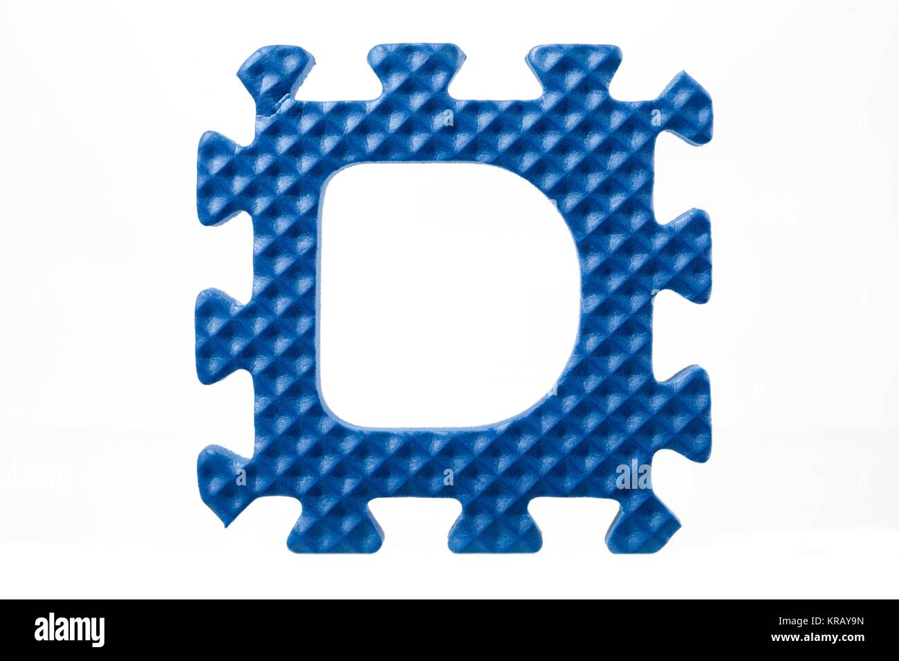 colored letter d puzzle piece Stock Photo - Alamy