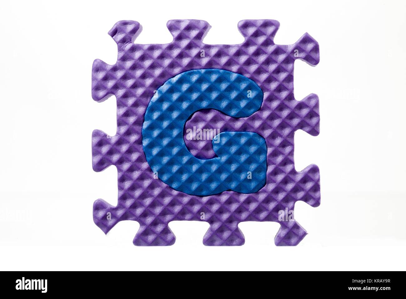 colored letter g puzzle piece Stock Photo - Alamy