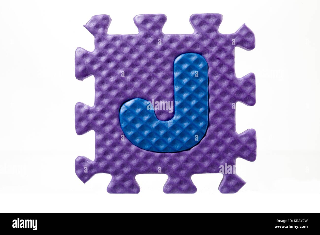 colored letter j puzzle piece Stock Photo - Alamy