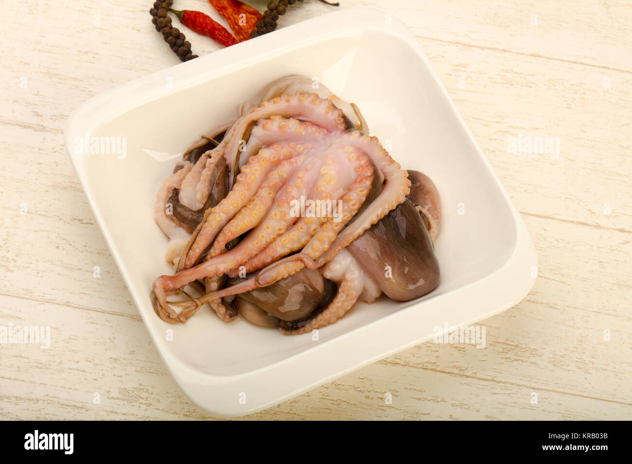 Raw octopus ready for cooking Stock Photo - Alamy