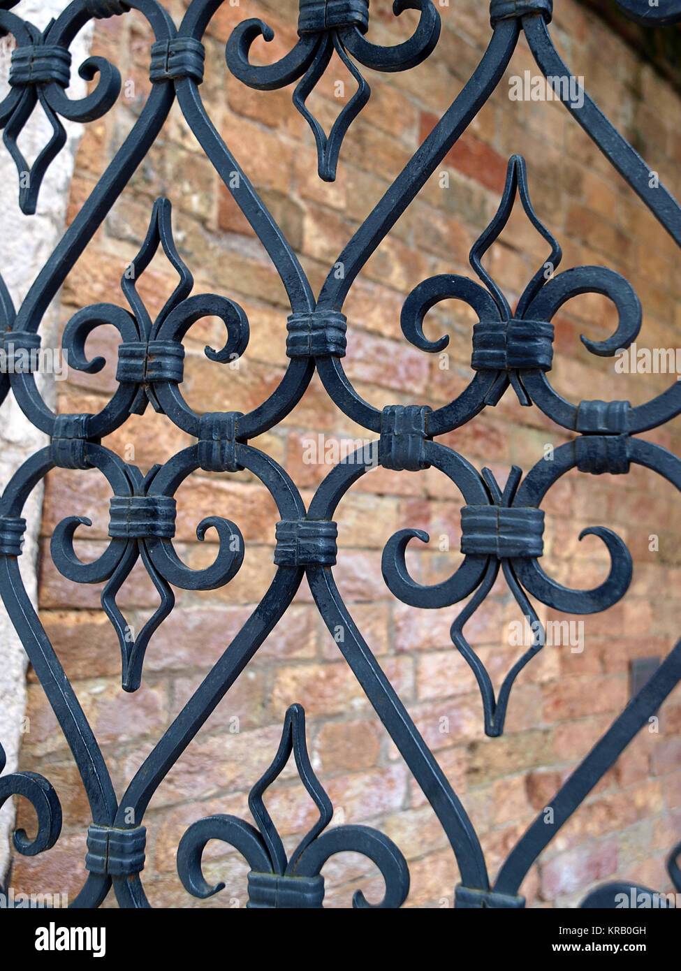 Hand made solid iron grille Stock Photo - Alamy