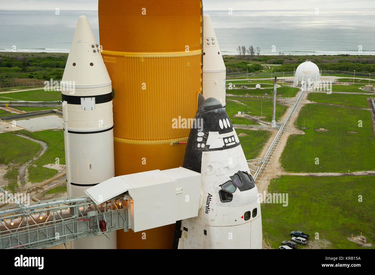 The space shuttle Atlantis is revealed as the rotating service ...