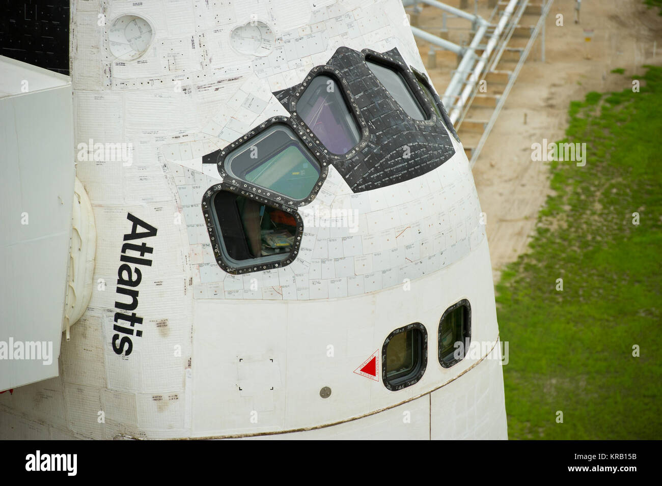 The space shuttle Atlantis is revealed as the rotating service ...