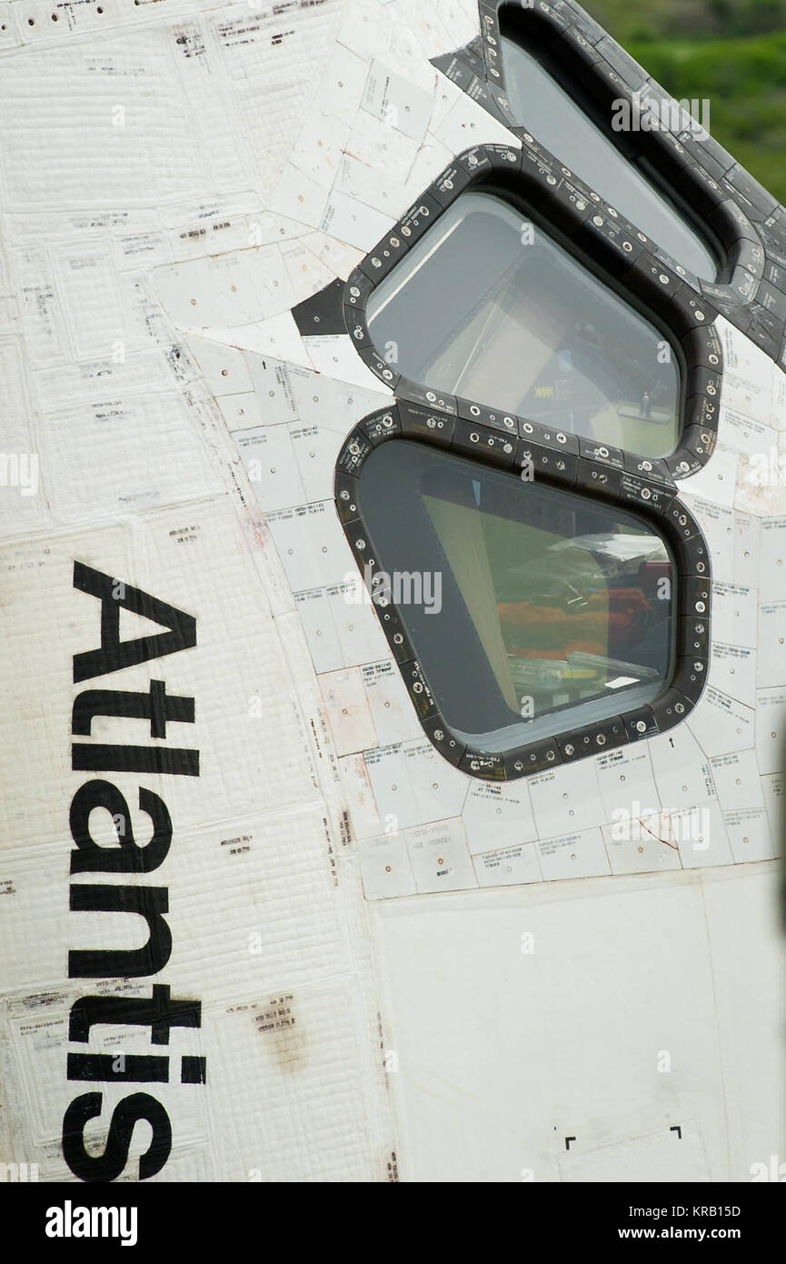The space shuttle Atlantis is revealed as the rotating service ...