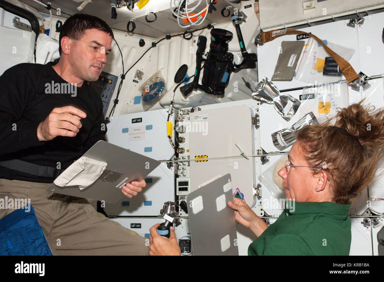 STS-135 Rex Walheim and Sandy Magnus Stock Photo - Alamy