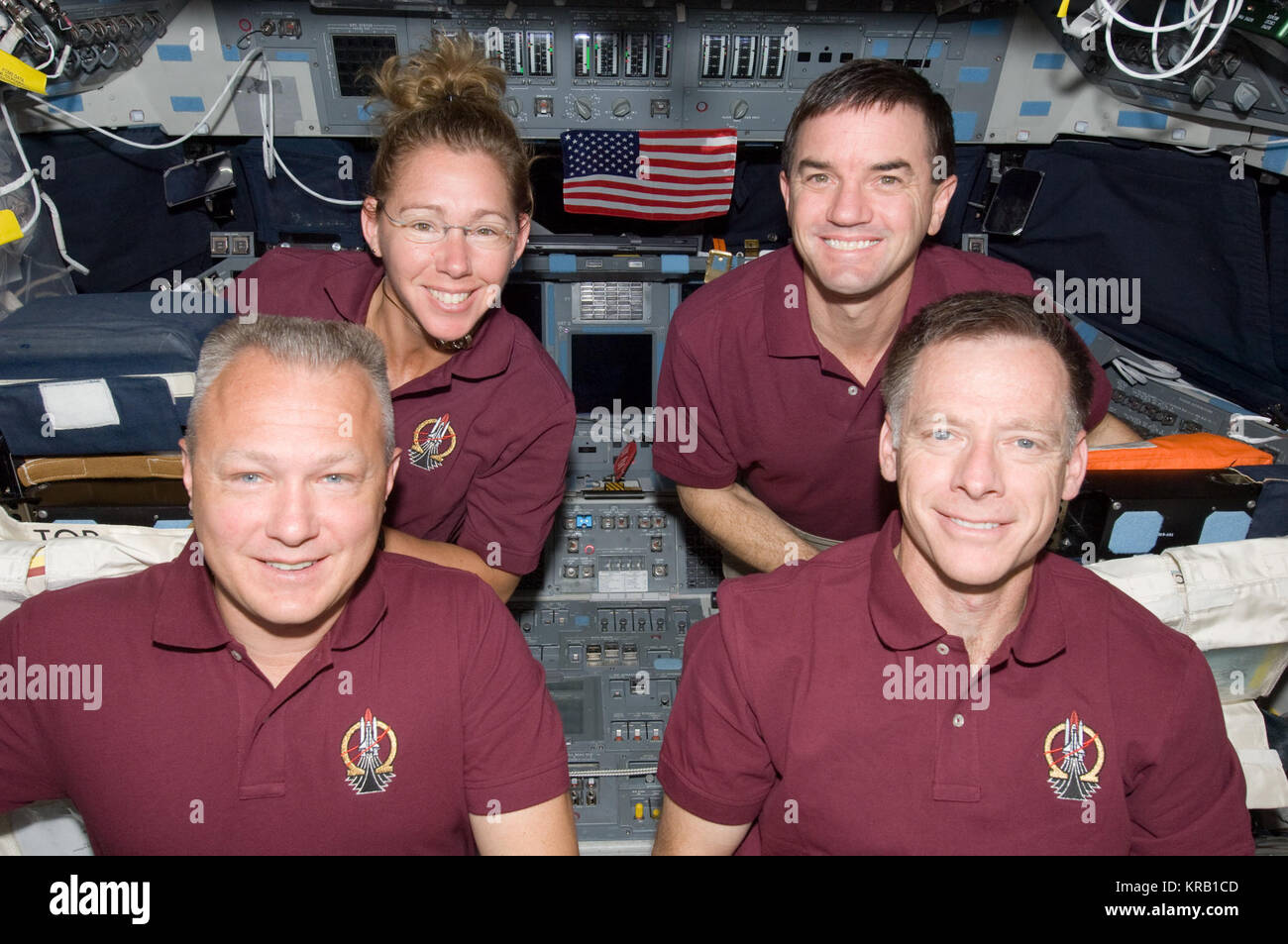 STS-135 crew members on the flight deck Stock Photo - Alamy