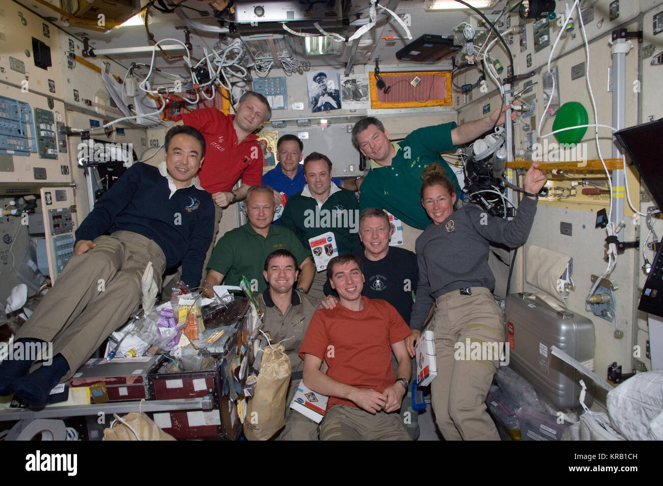 STS-135 and Expedition 28 crews in the Zvezda service module Stock ...