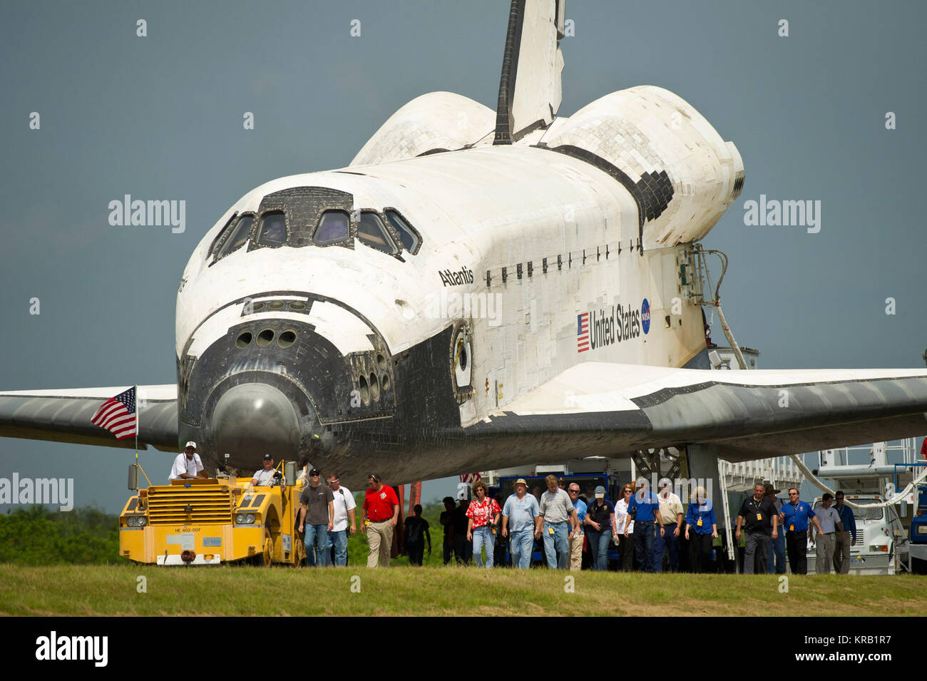 Space shuttle Atlantis (STS-135) is rolled over to the Obiter Processing Facility (OPF) shortly ...