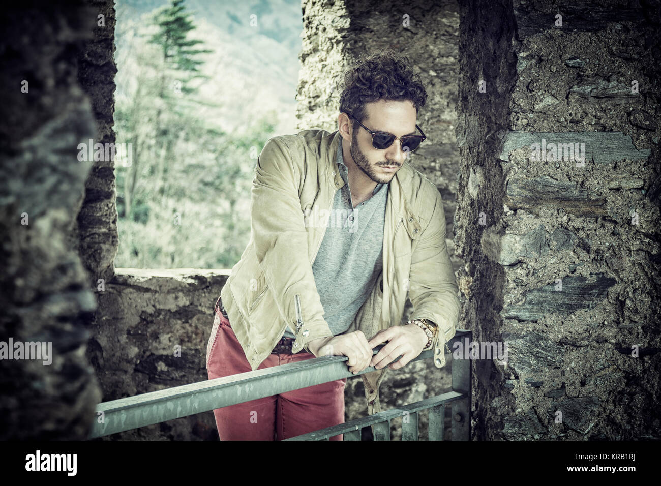 Attractive man outdoor in old European castle Stock Photo - Alamy