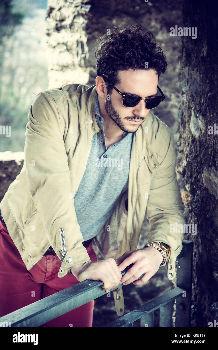 Attractive man outdoor in old European castle Stock Photo - Alamy