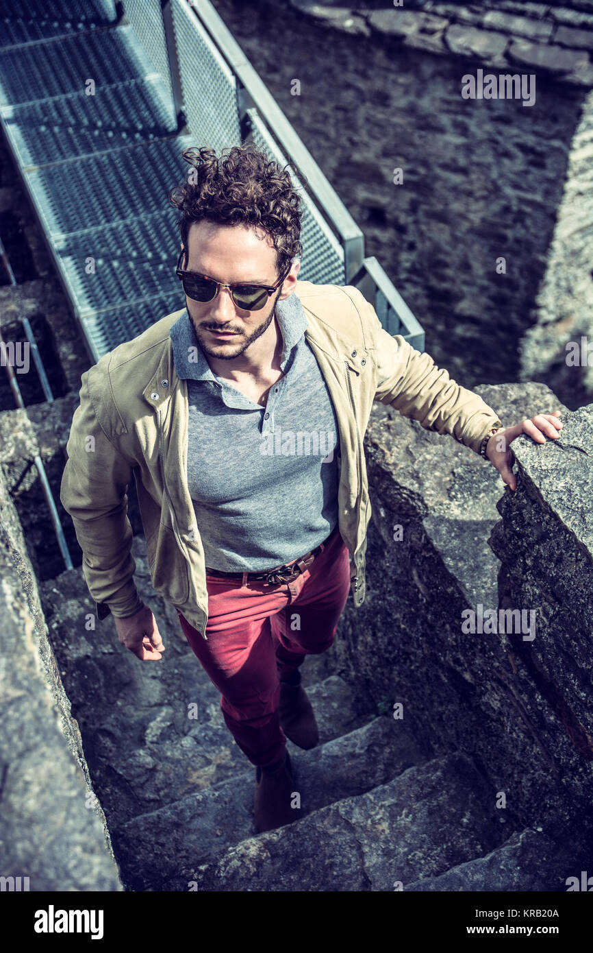 Attractive man outdoor in old European castle Stock Photo - Alamy
