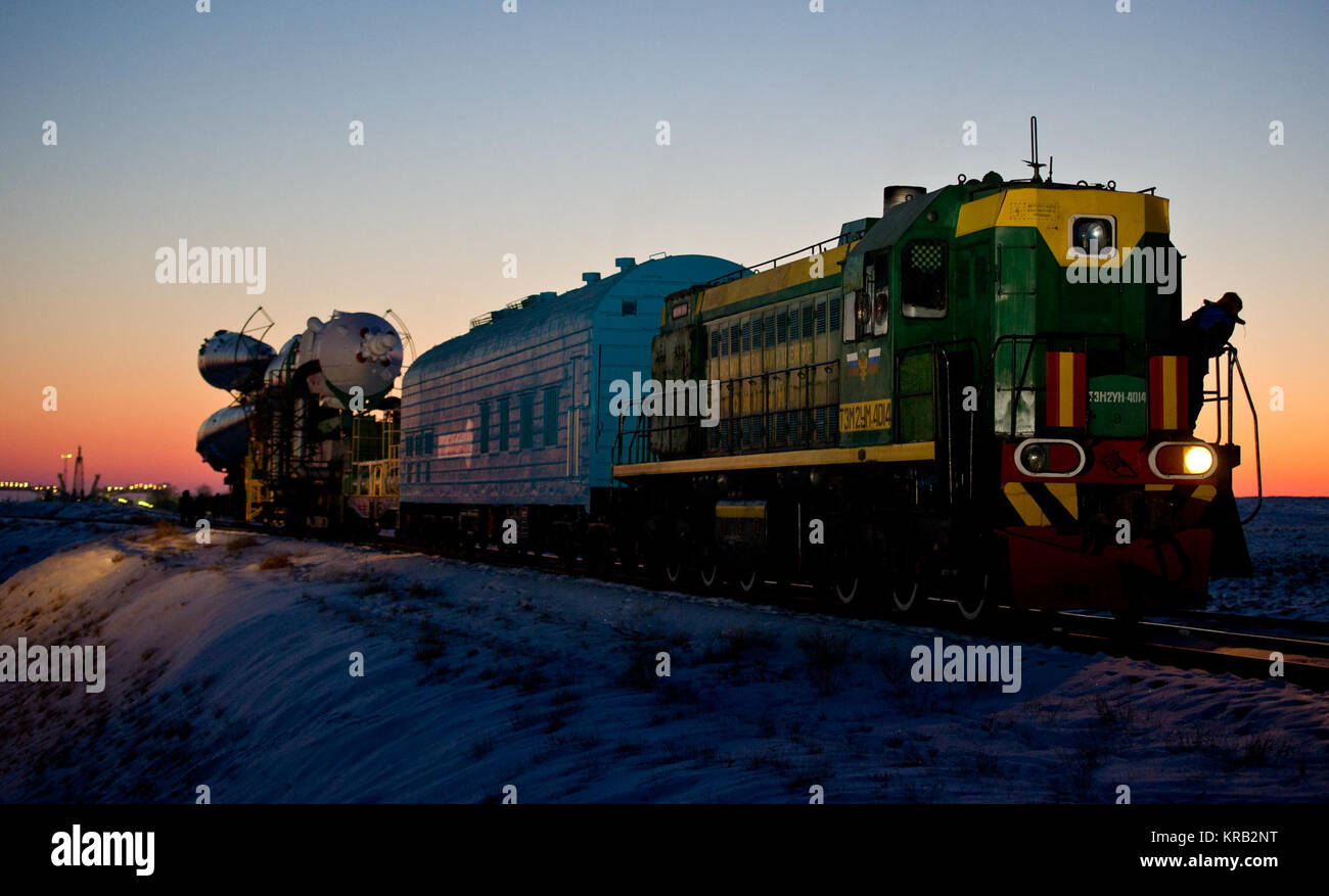 The Soyuz TMA-03M spacecraft is rolled out by train on its way to the ...