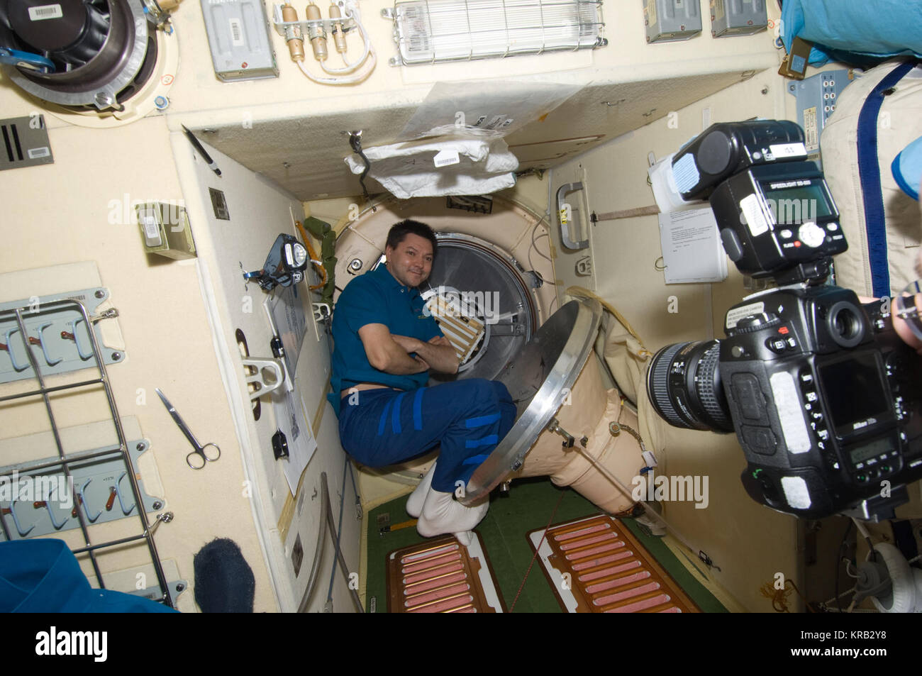 ISS-30 Oleg Kononenko in the Pirs Module with Progress M-13M and the Chibis-M satellite Stock ...
