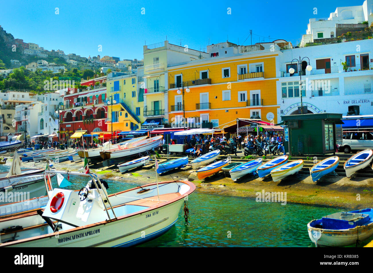 Boats, buildings and hills on the coast of Capri Stock Photo - Alamy