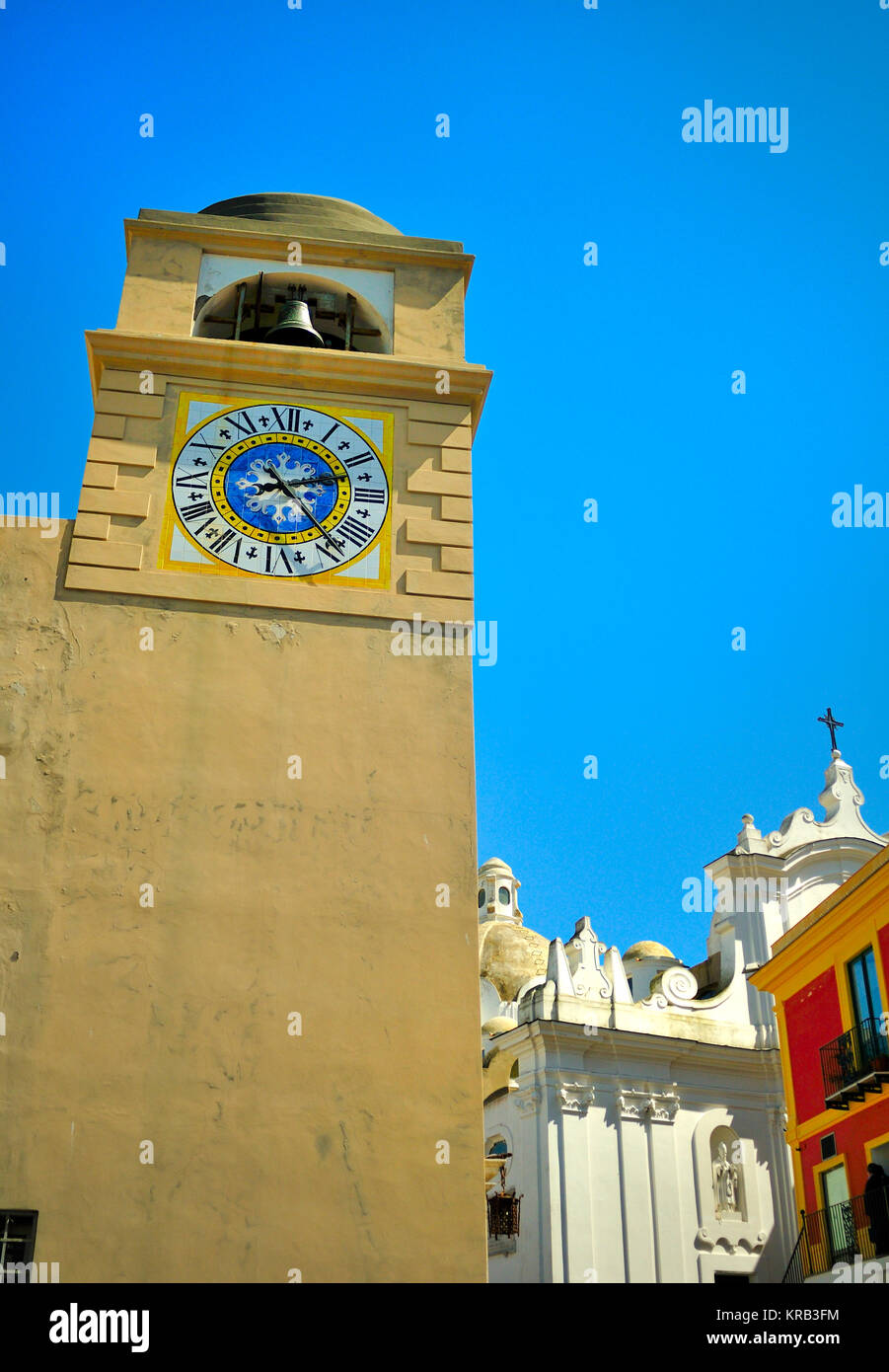 Clocktower in Piazza Umberto, Capri with Chiesa di Santo Stefano in the ...