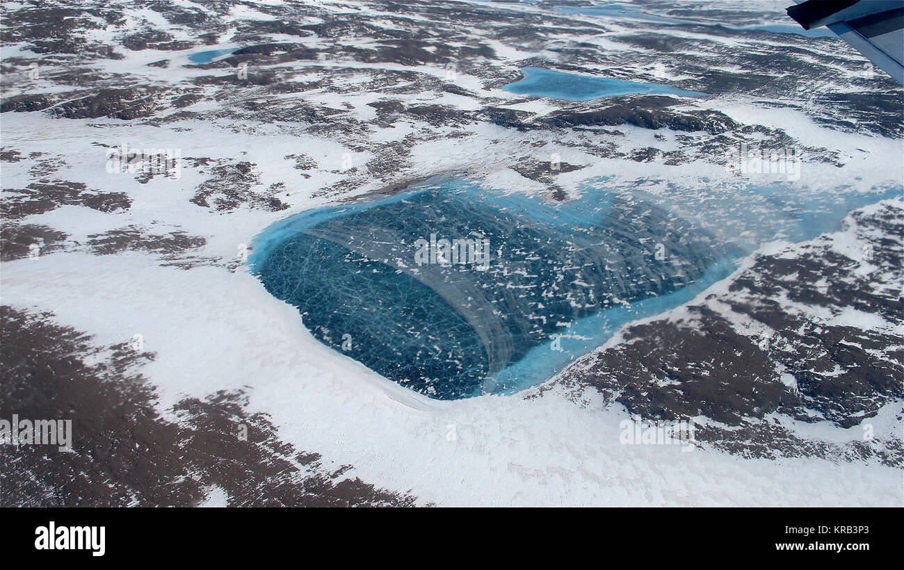 Frozen meltwater lake along the northeast Greenland coast, as seen from ...