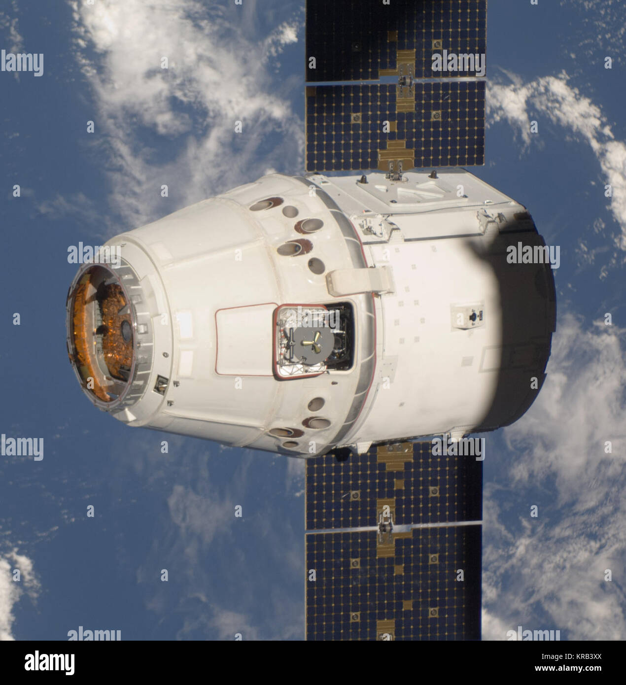 SpaceX Dragon C2 vehicle approaches ISS (ISS031-E-071140 Stock Photo ...