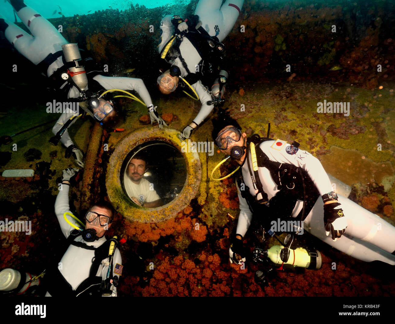 NEEMO 16 crew around hatch Stock Photo - Alamy