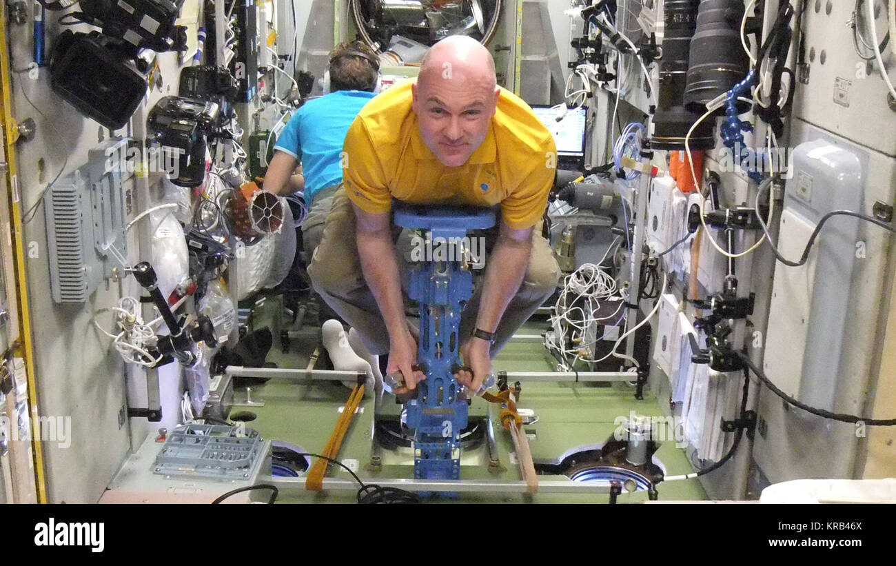 ISS-31 André Kuipers uses a body mass measurement device Stock Photo ...