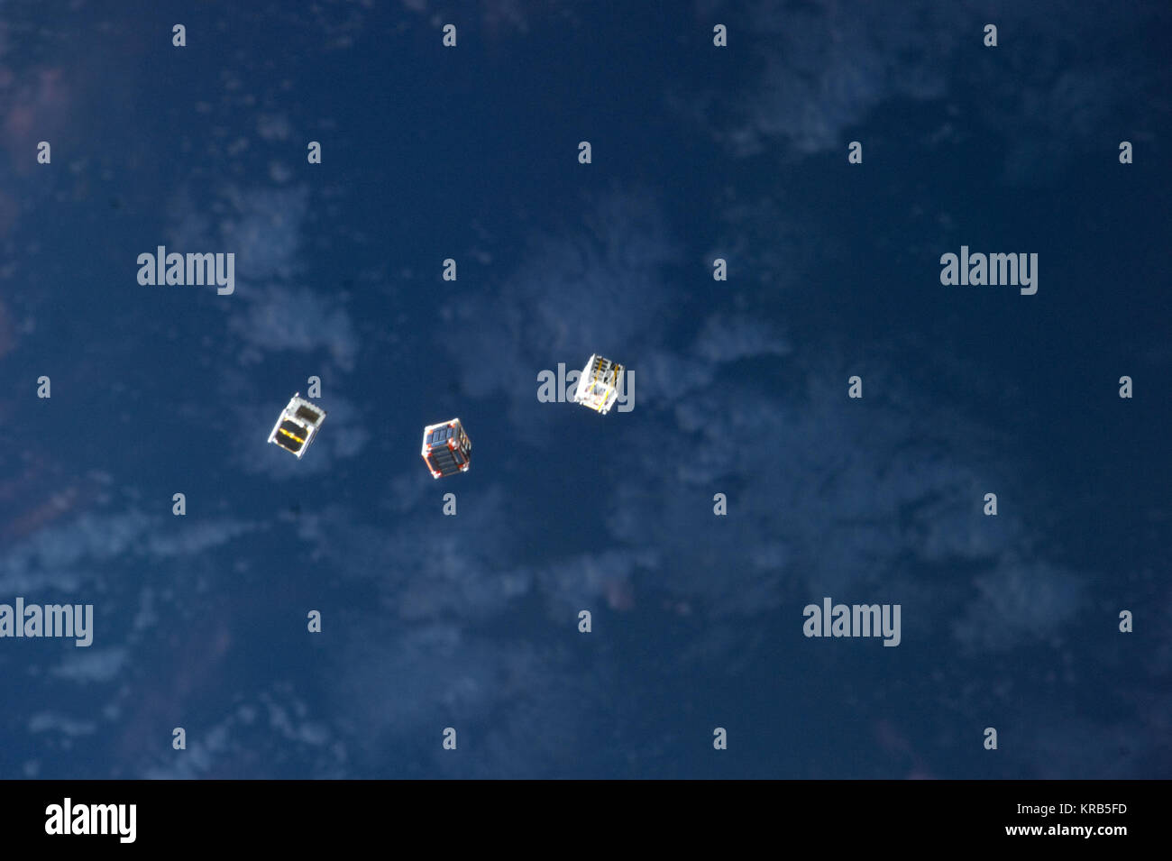ISS-33 Several tiny satellites 3 Stock Photo - Alamy
