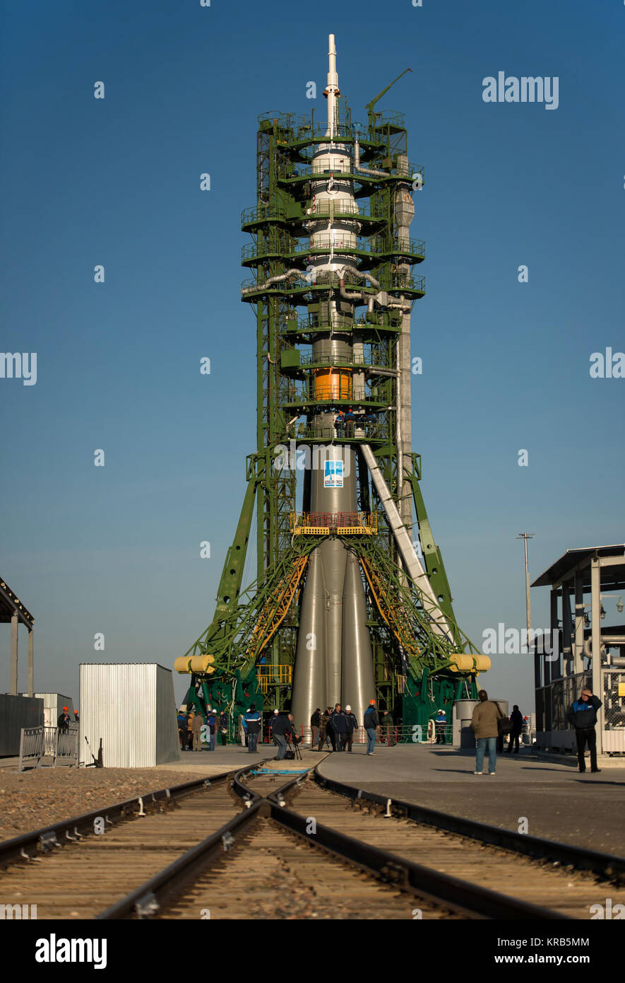 The Soyuz rocket is erected into position after being rolled out to the ...