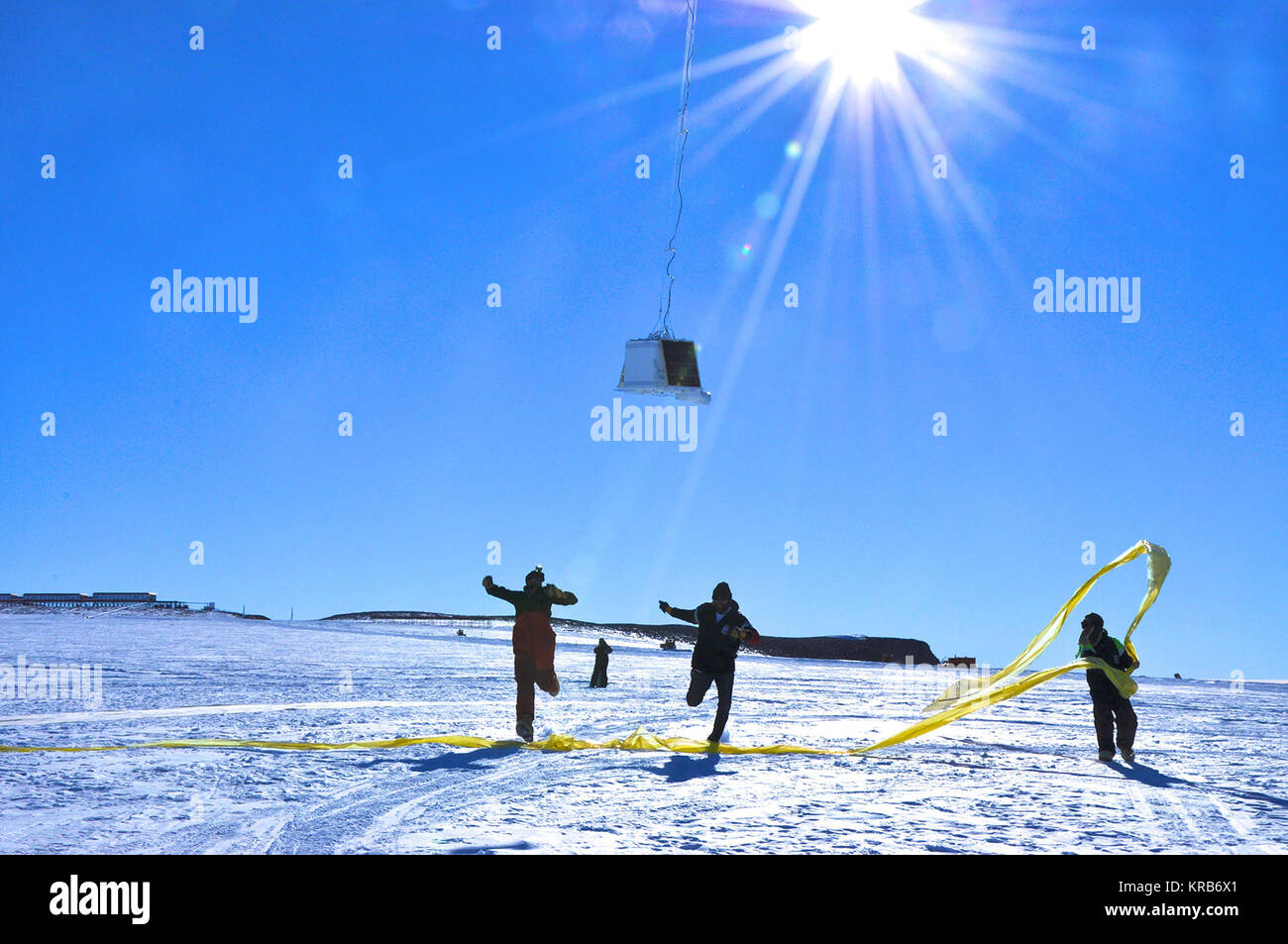 BARREL team members run under the payload as the balloon first takes ...