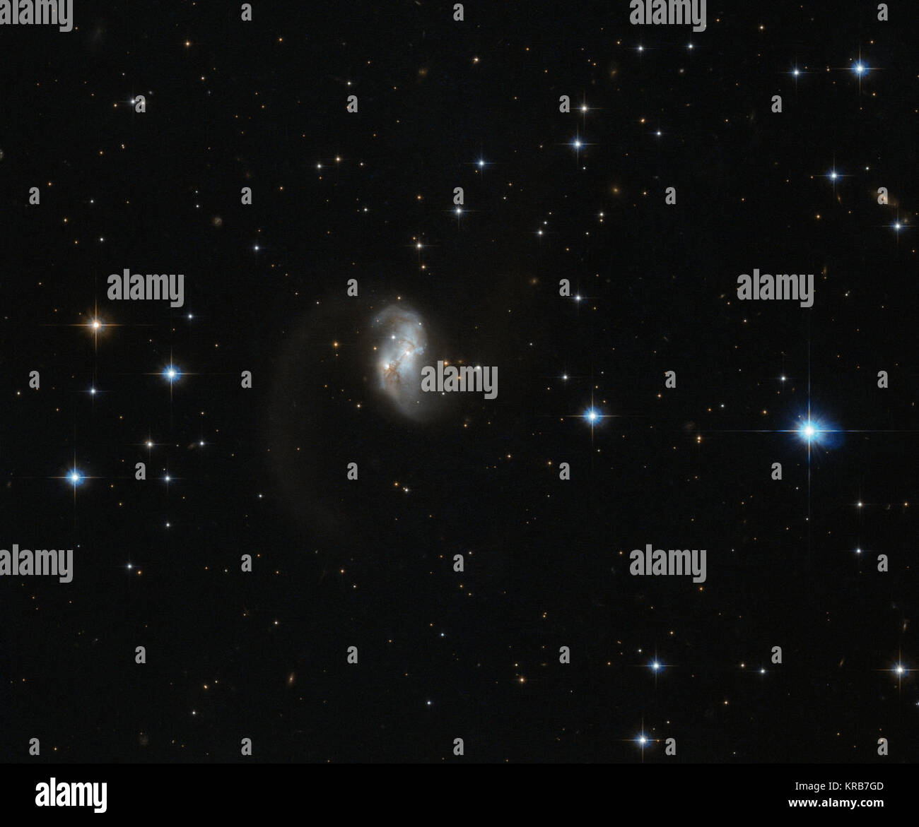 This charming and bright galaxy, known as IRAS 23436+5257, was captured ...