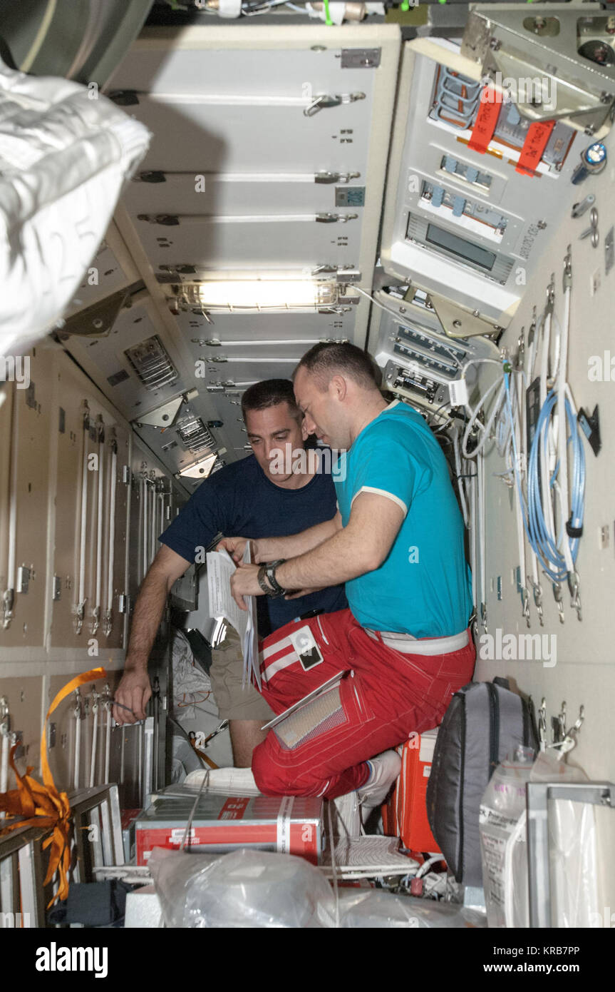 ISS-35 Alexander Misurkin and Chris Cassidy work in Rassvet Stock Photo ...
