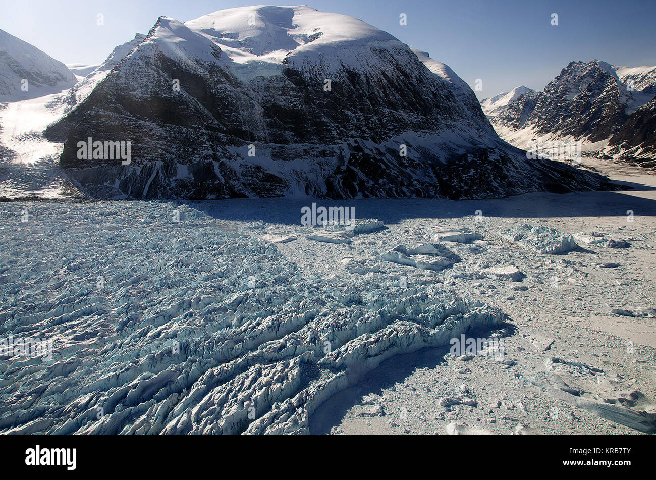 Calving front with ice bergs and mélange at Kangerdlugssup Glacier in ...