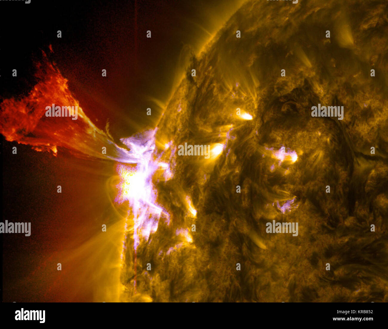A burst of solar material leaps off the left side of the sun Stock ...