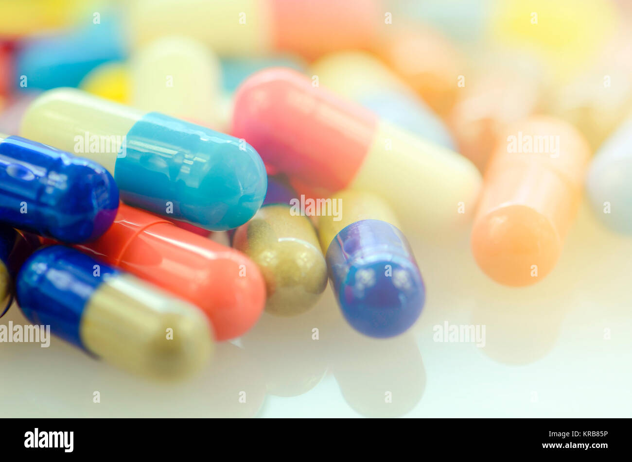 Oral medication background with warm light.Colorful of oral medications ...