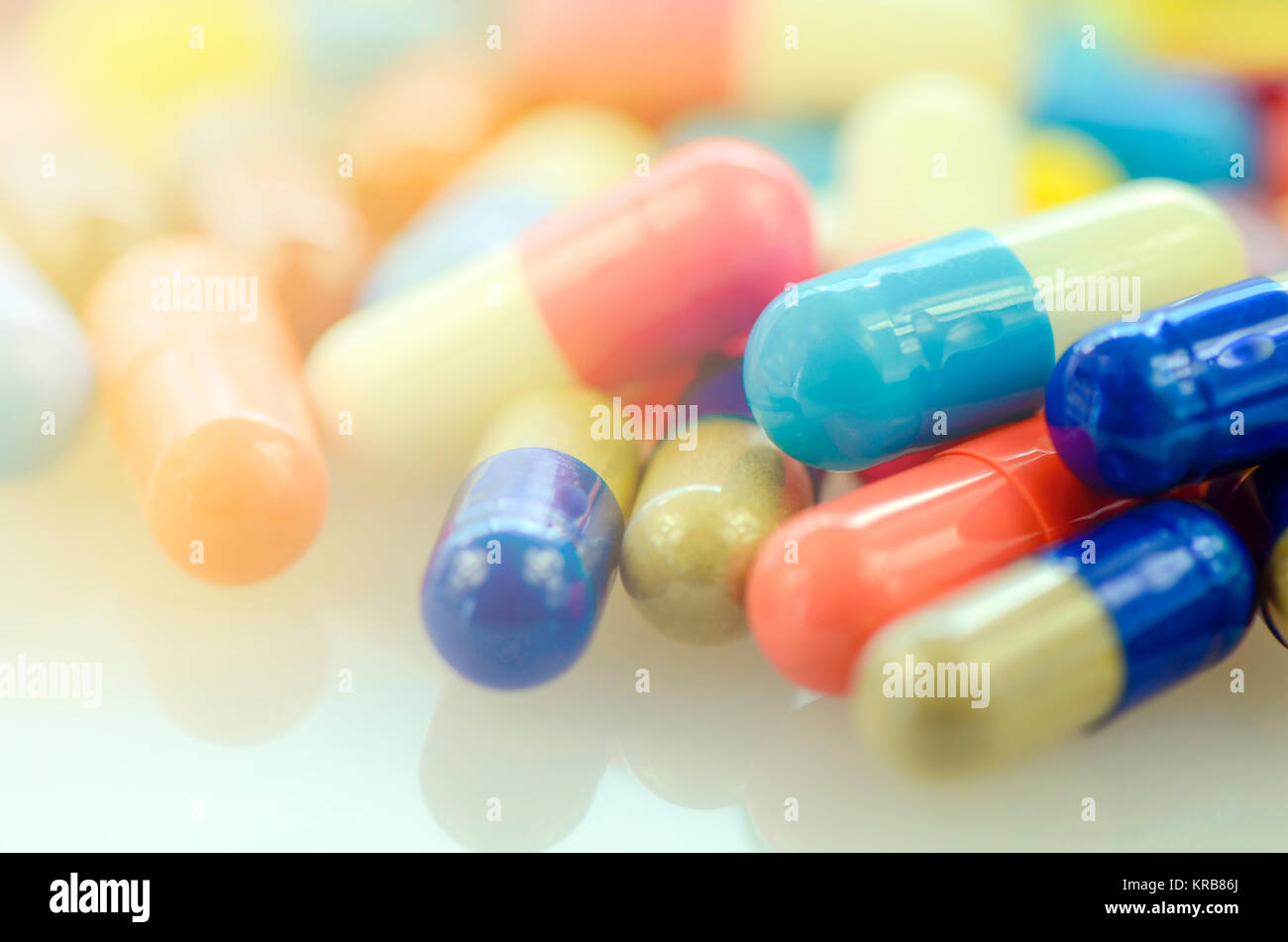 Oral medication background with warm light.Colorful of oral medications ...
