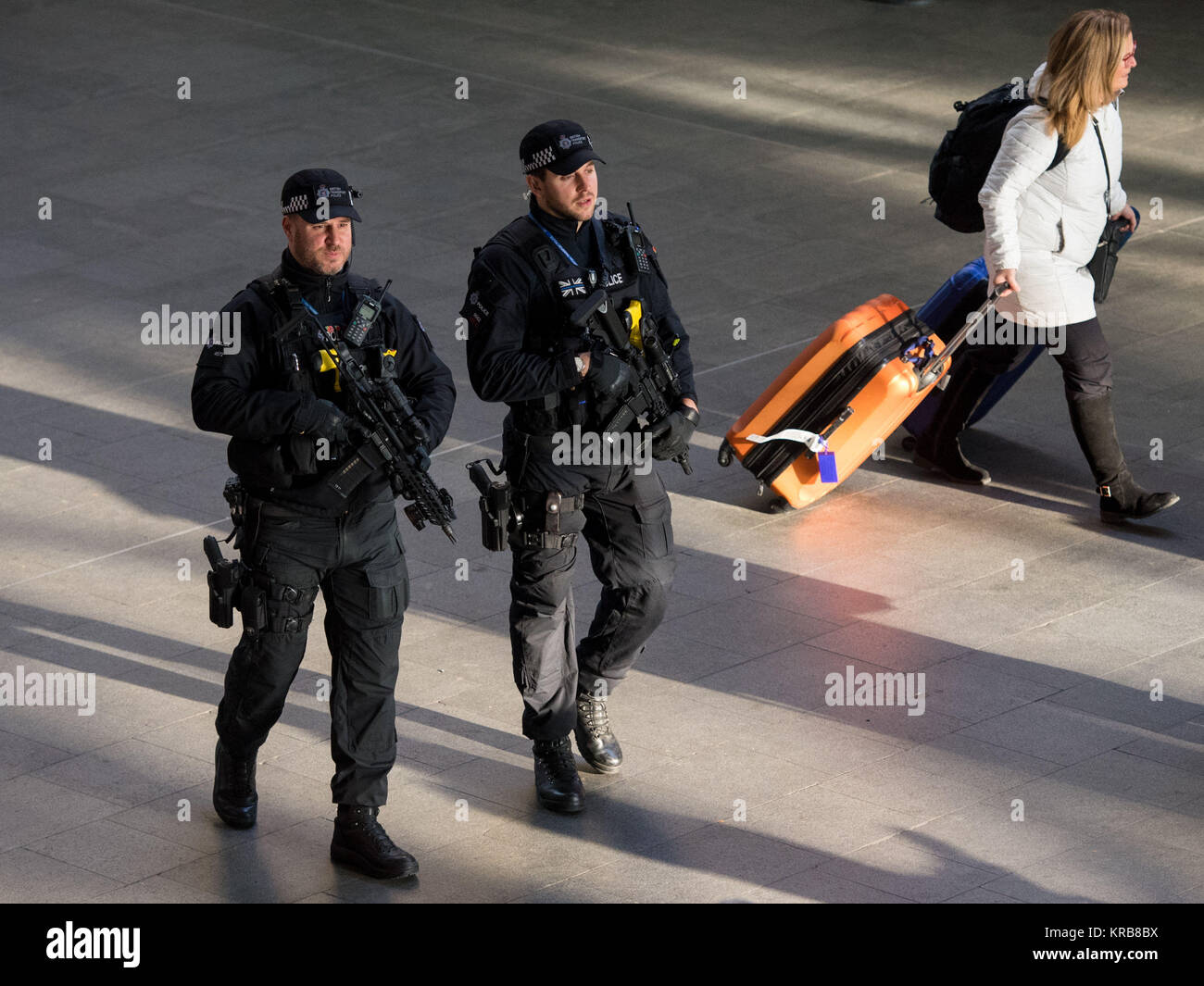 Armed British Transport Police officers on patrol at Kings Cross ...