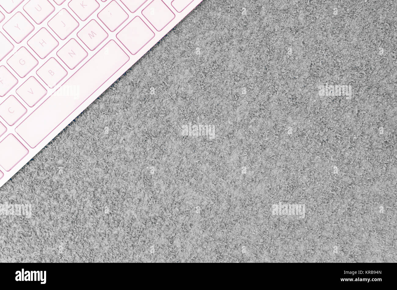 part of computer keyboard on rough textured surface - colored copy ...