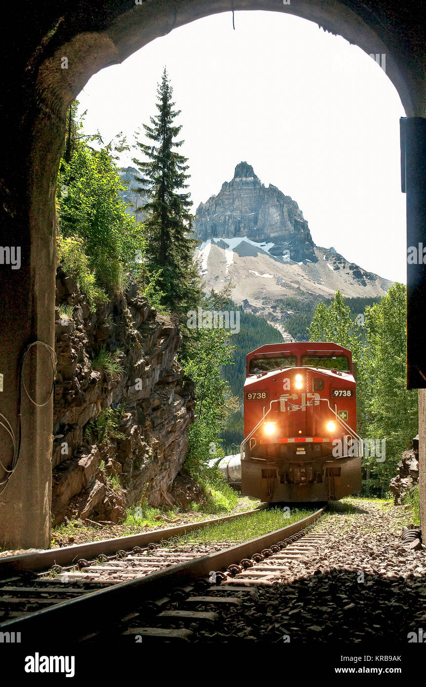 CP Rail westbound mixed freight led by loco 9738 enters upper portal of ...