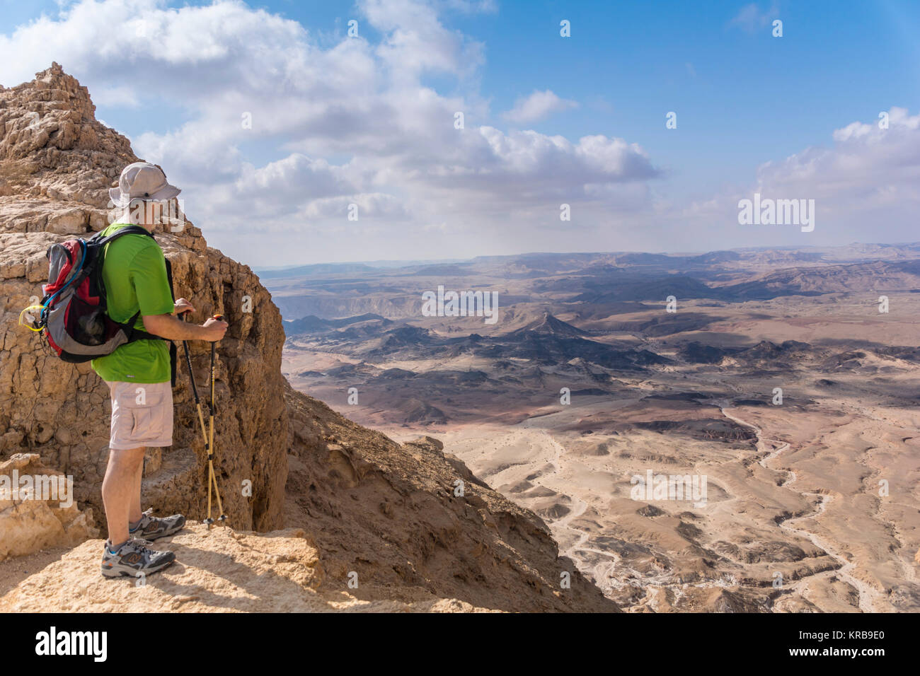 Mount Ardon, Ramon Crater, Negev Deset, Israel. A man looks at the ...