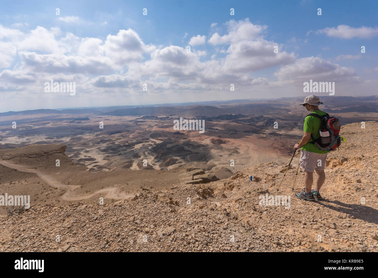 Mount Ardon, Ramon Crater, Negev Deset, Israel. A man looks at the ...